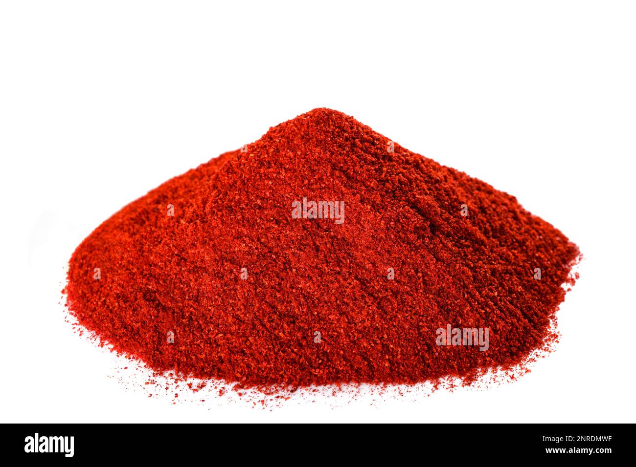 Chili peppers powder pile isolated on white backgroud Stock Photo - Alamy