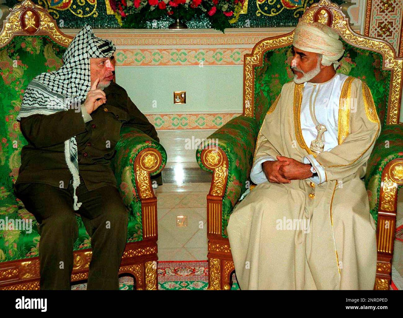File - In this Tuesday, Sept. 12, 2000 file photo, Palestinian leader Yasser Arafat, left, calls ...