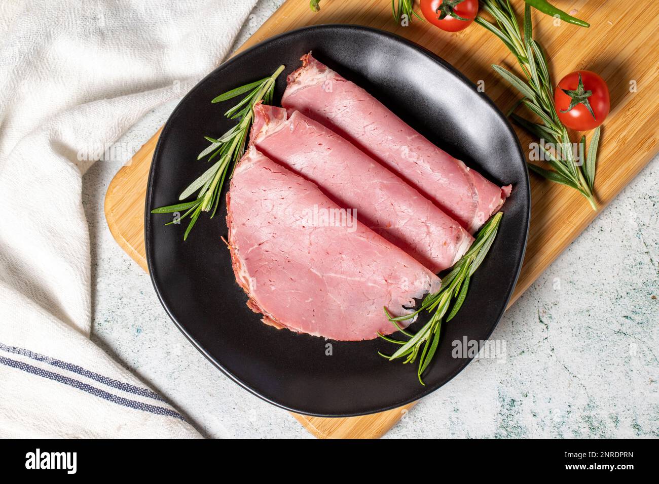 Beef salami slice in plate. Dried smoked ribeye salami. Top view Stock ...