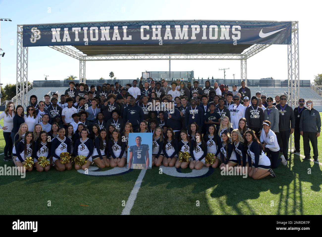 Members of the St. John Bosco Braves football team and coach Jason ...