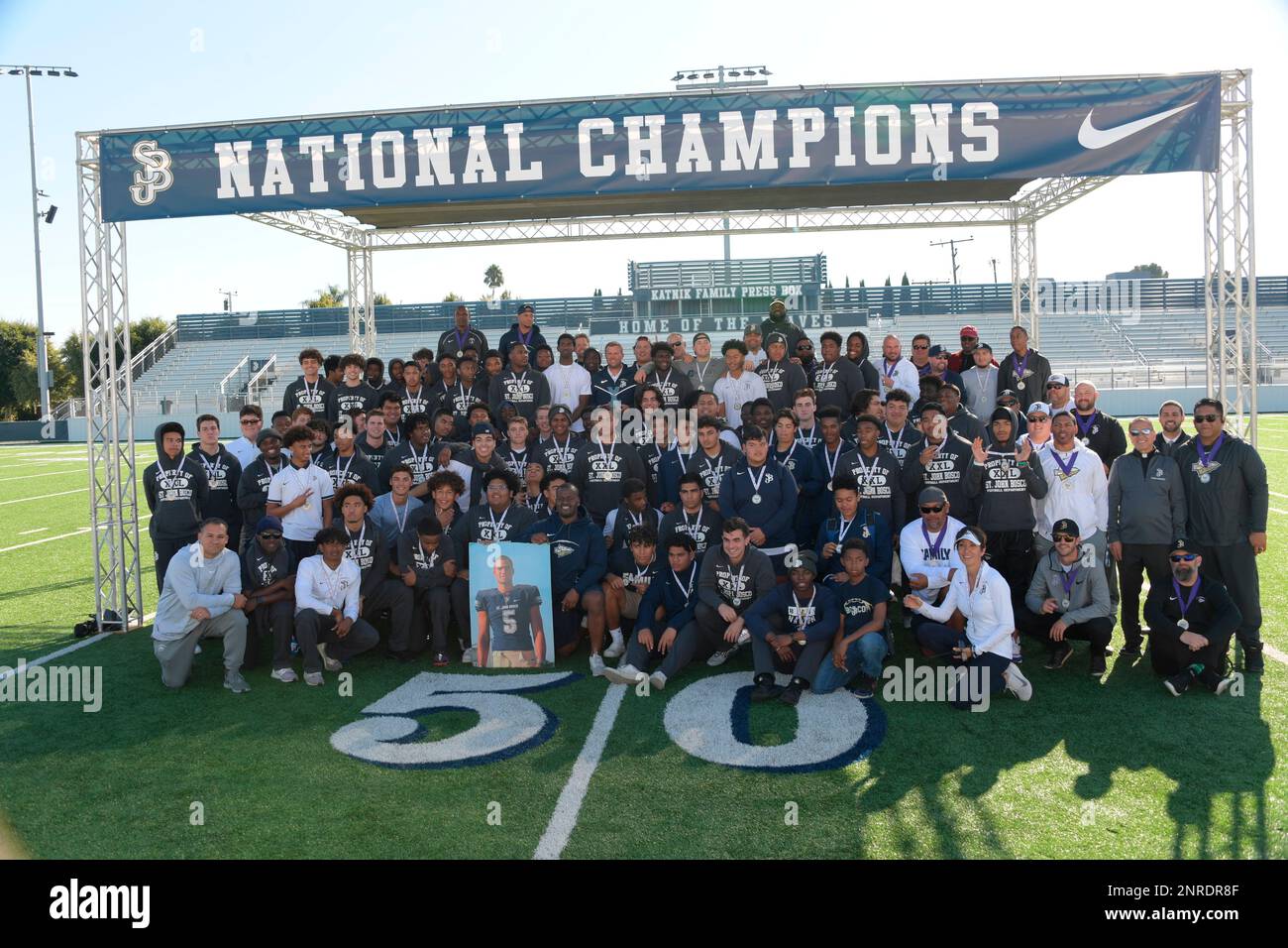 Members of the St. John Bosco Braves football team and coach Jason ...