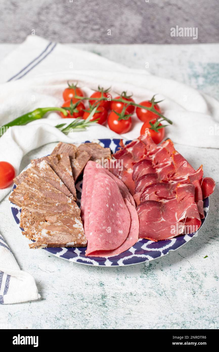 Cold Smoked Meat Plate, antipasto set platter. Roasted meat, salami and ...