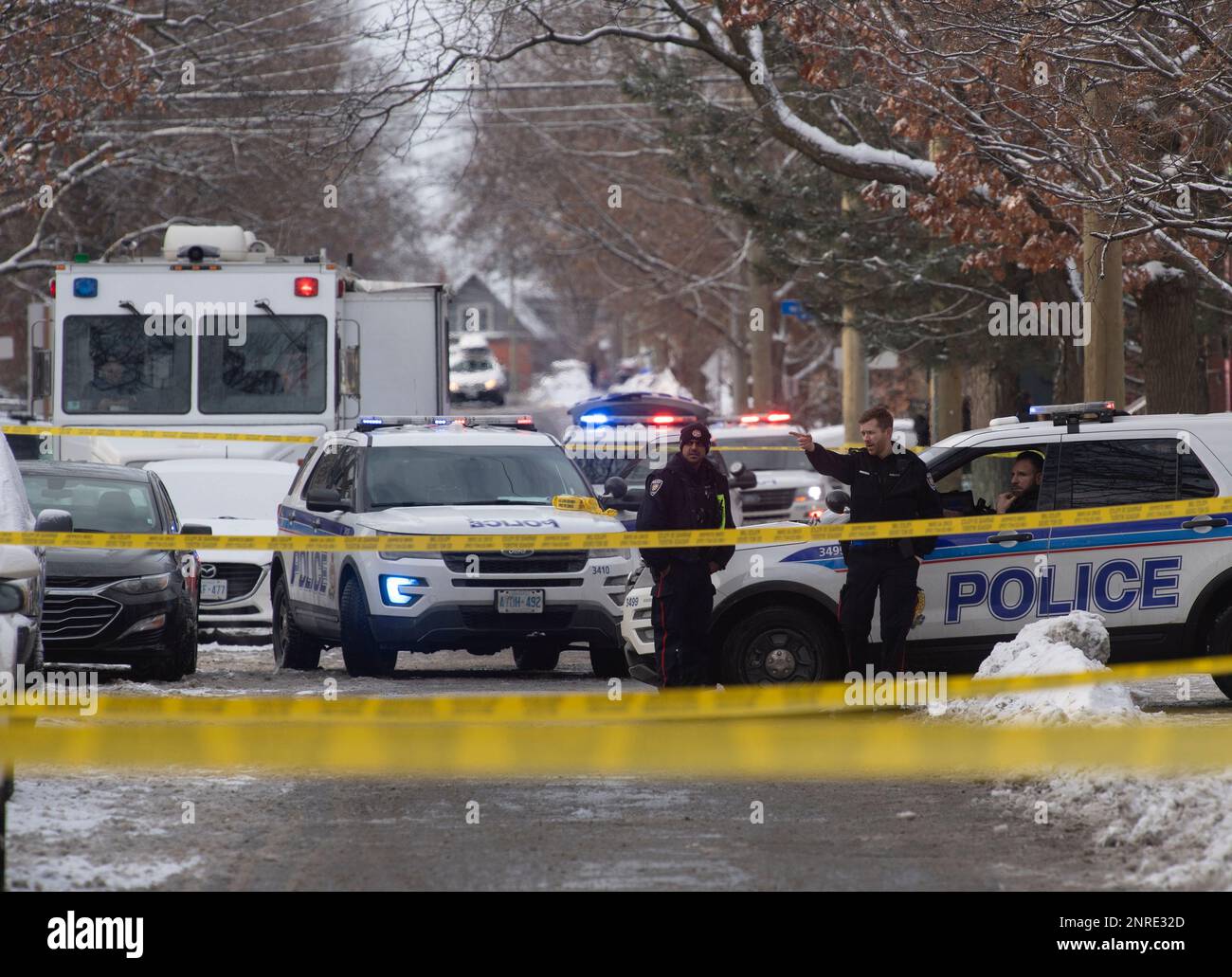 Police inspect the scene of a shooting in downtown Ottawa on Wednesday ...