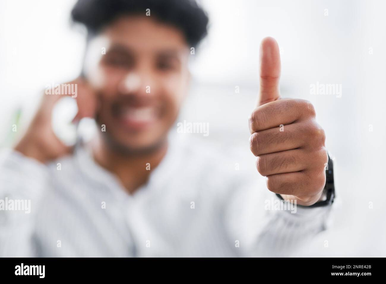 Youre done great. Closeup shot of an unrecognisable businessman showing ...