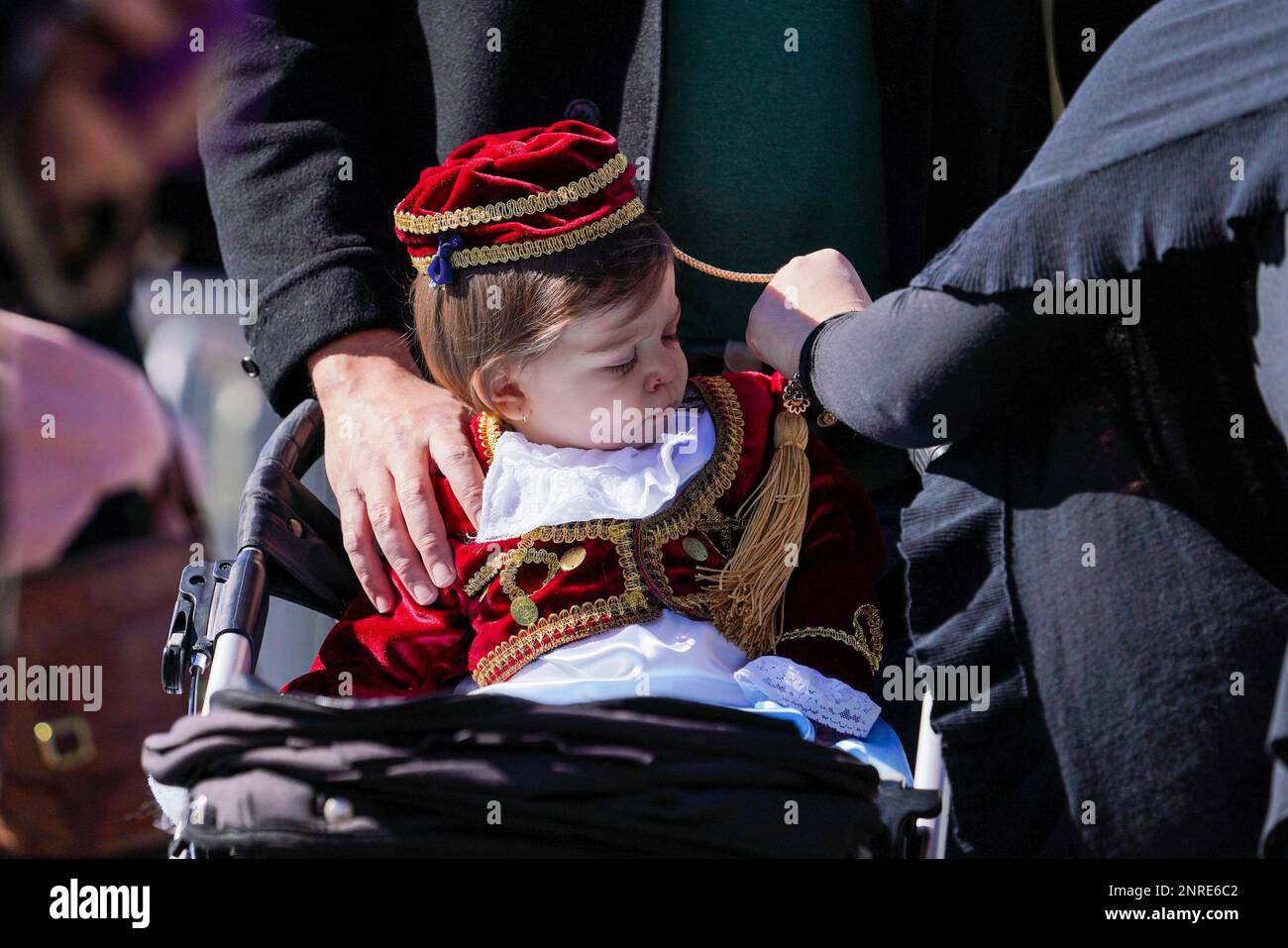 Elia Kazaleh, 10 months, is pictured traditional Greek dress for the ...