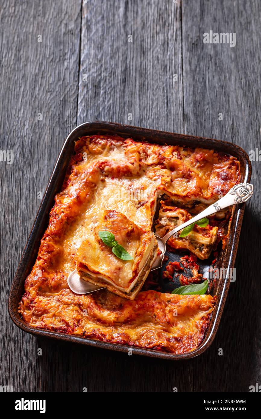 Lasagna with ricotta cheese, ground beef, mushrooms, and tomato sauce ...