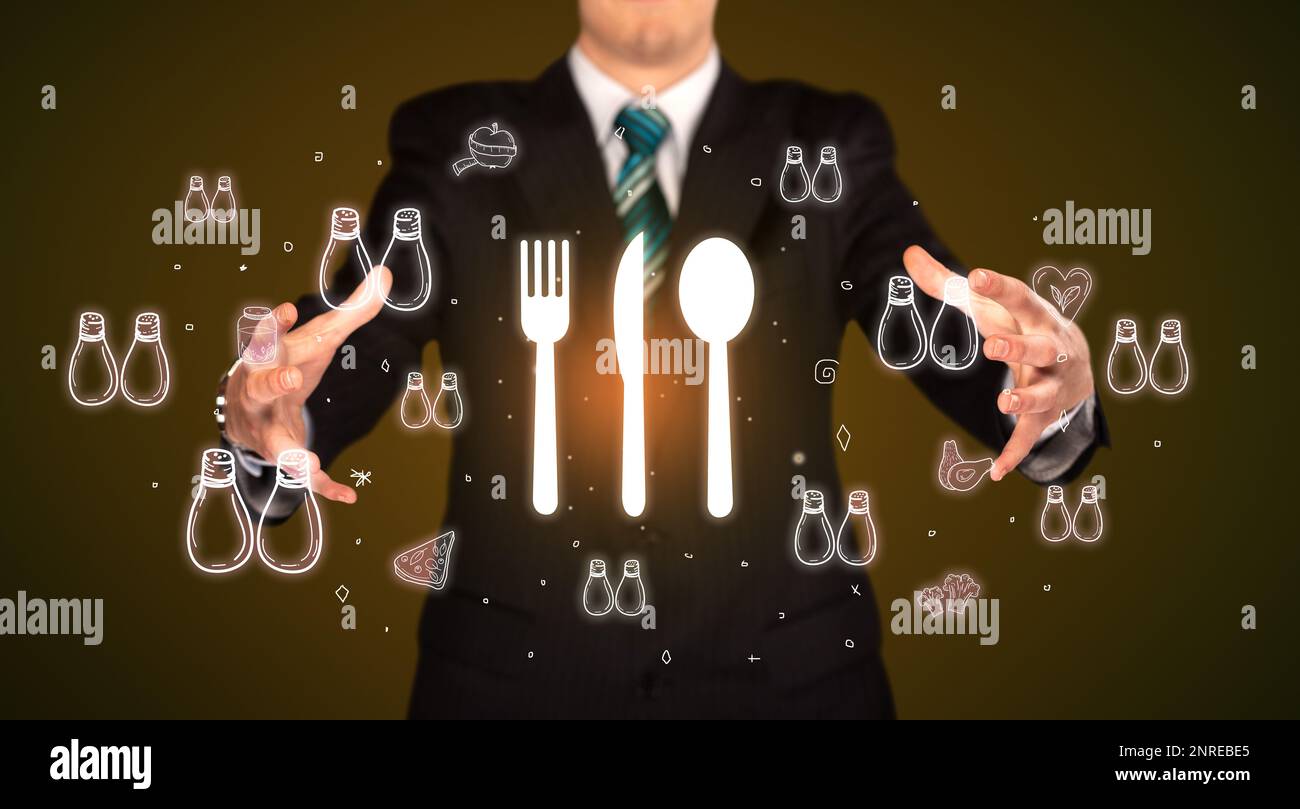 Hand holding food related icons Stock Photo - Alamy