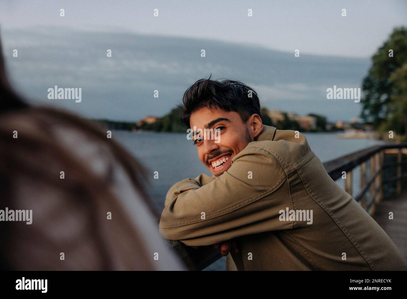 Side view portrait happy young hi-res stock photography and images - Alamy