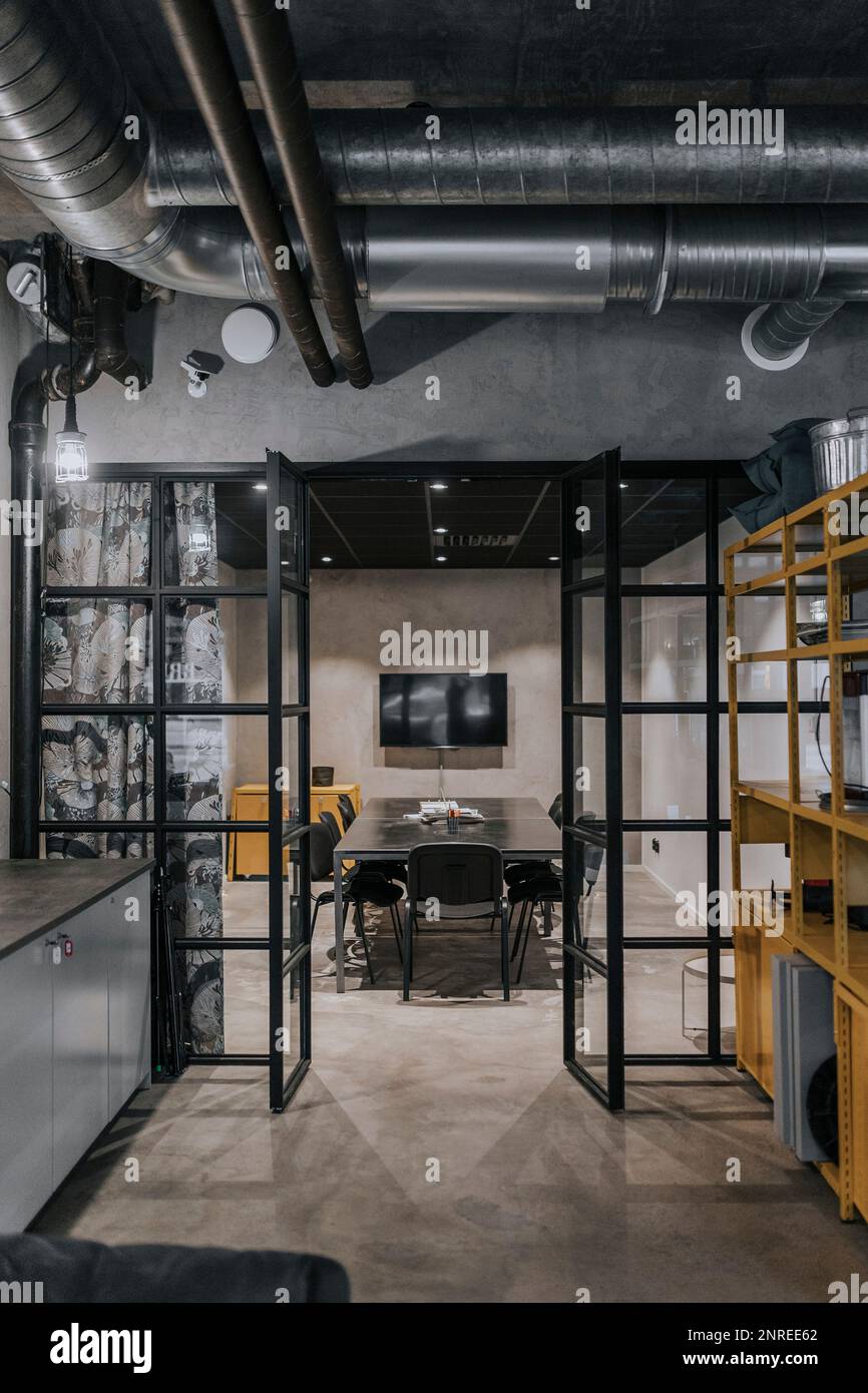 Interior of board room in illuminated office Stock Photo - Alamy