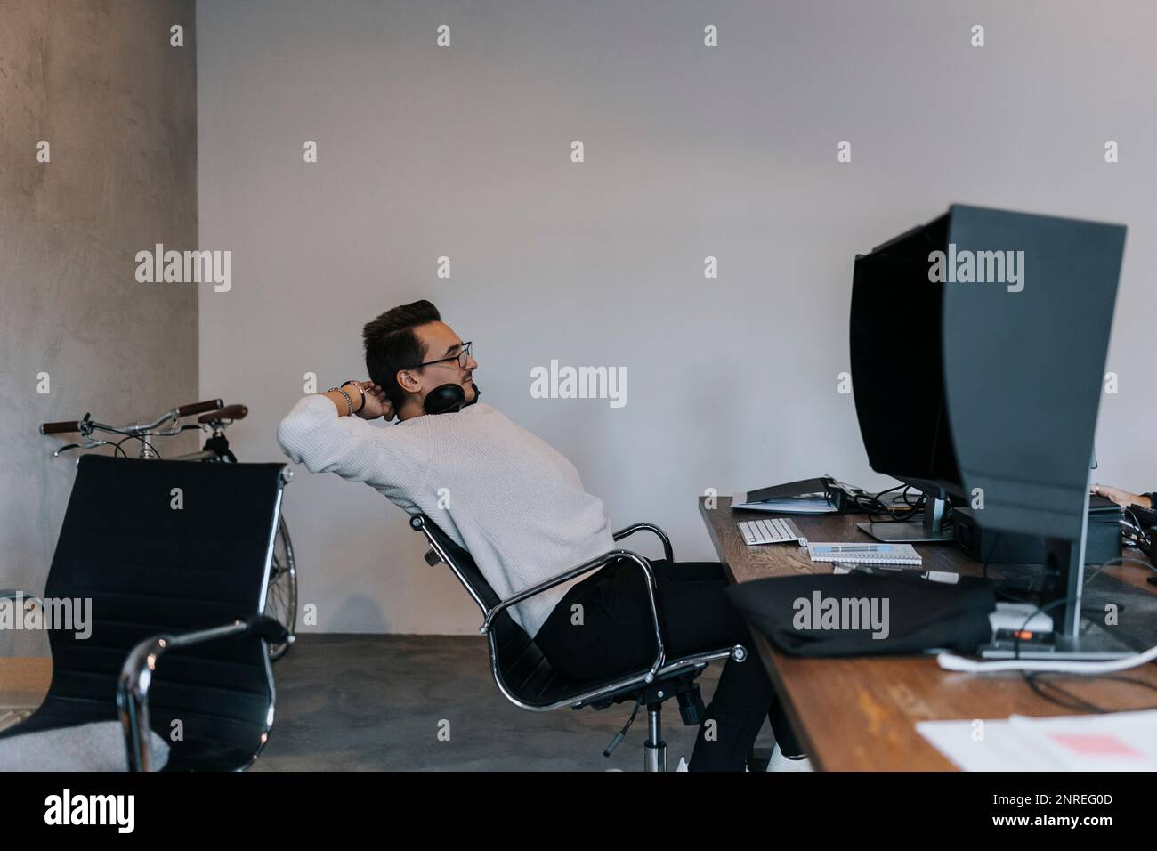 Person working on computer behind hi-res stock photography and images ...