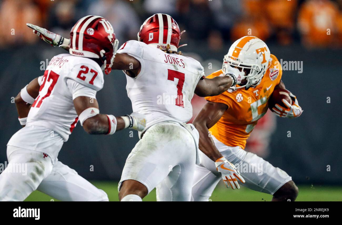 Tennessee wide receiver Josh Palmer (5) is grabbed by the facemark by ...