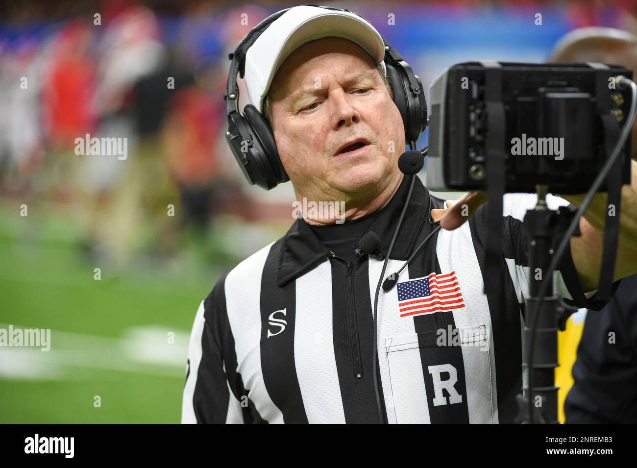 NEW ORLEANS, LA - JANUARY 01: Referee Jerry McGinn looks at the replay ...