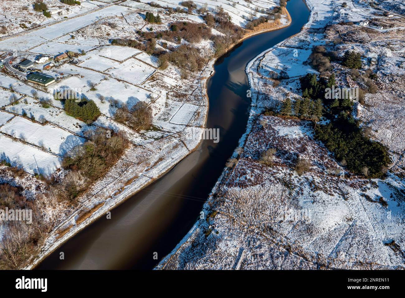 Aerial view of snow covered Gweebarra River between Doochary and ...