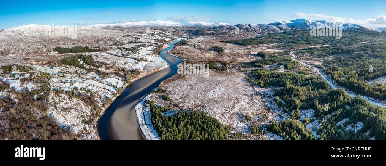 Aerial view of snow covered Gweebarra River between Doochary and ...