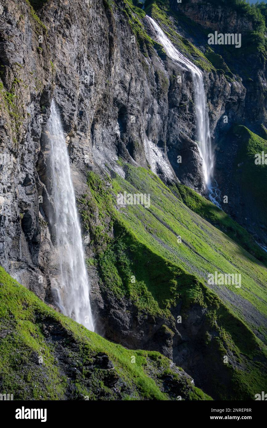 several large waterfalls falling down a steep cliff Stock Photo - Alamy