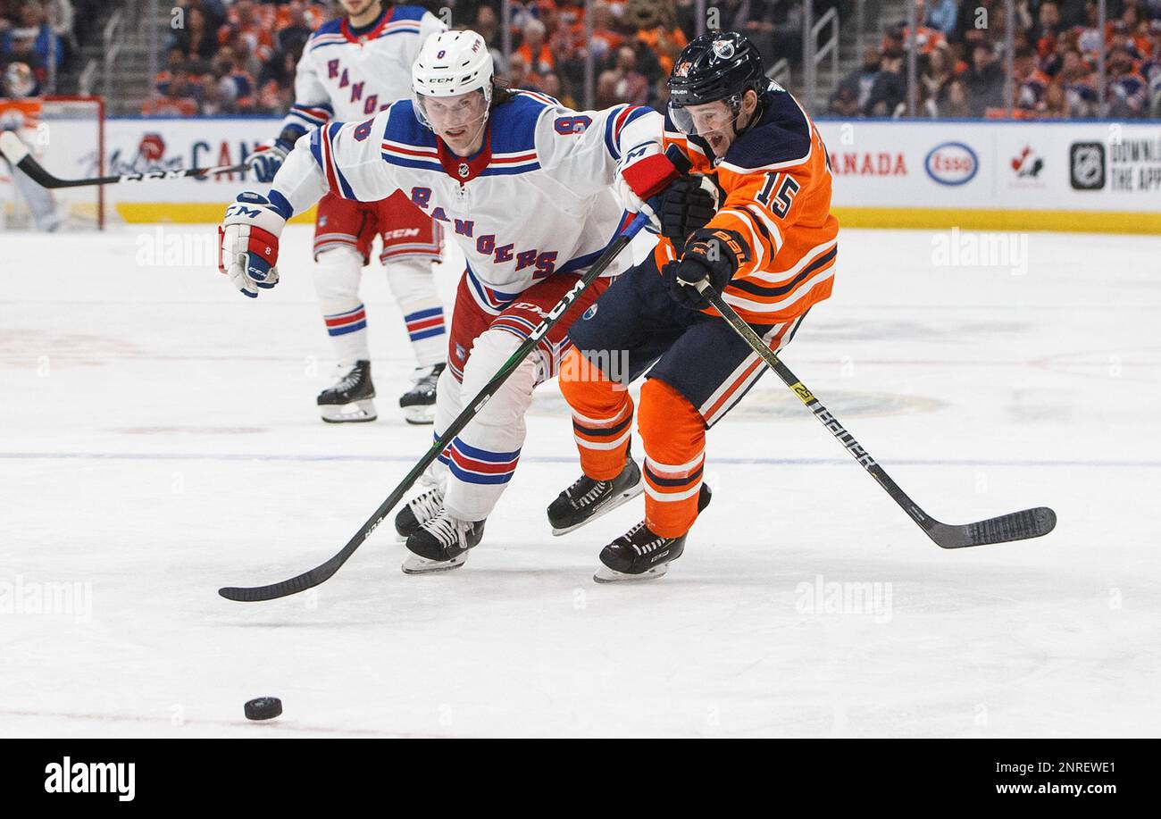 New York Rangers' Jacob Trouba (8) and Edmonton Oilers' Josh Archibald ...