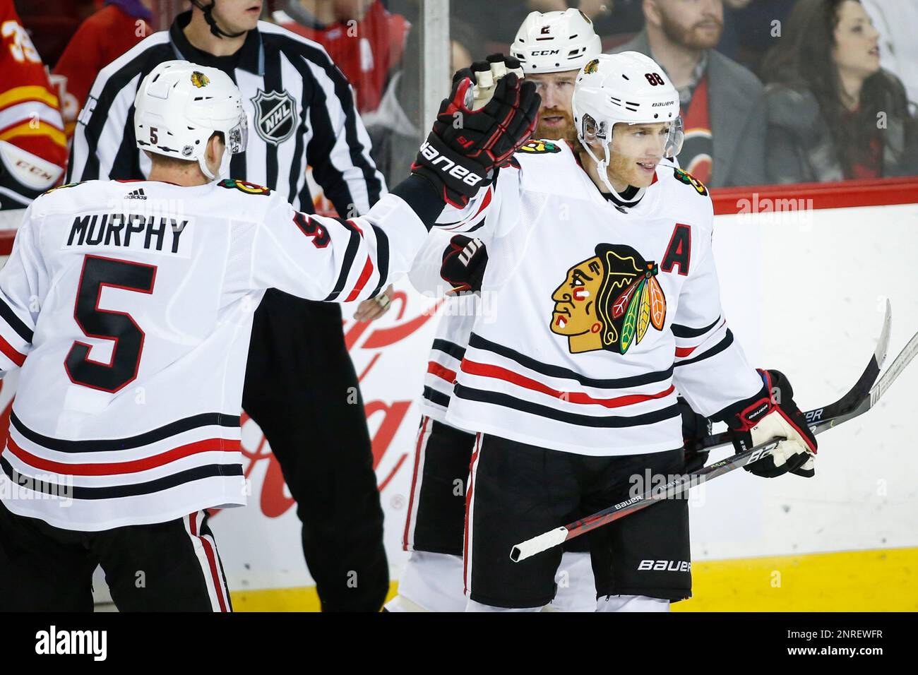 Chicago Blackhawks' Patrick Kane, right, celebrates his goal with ...