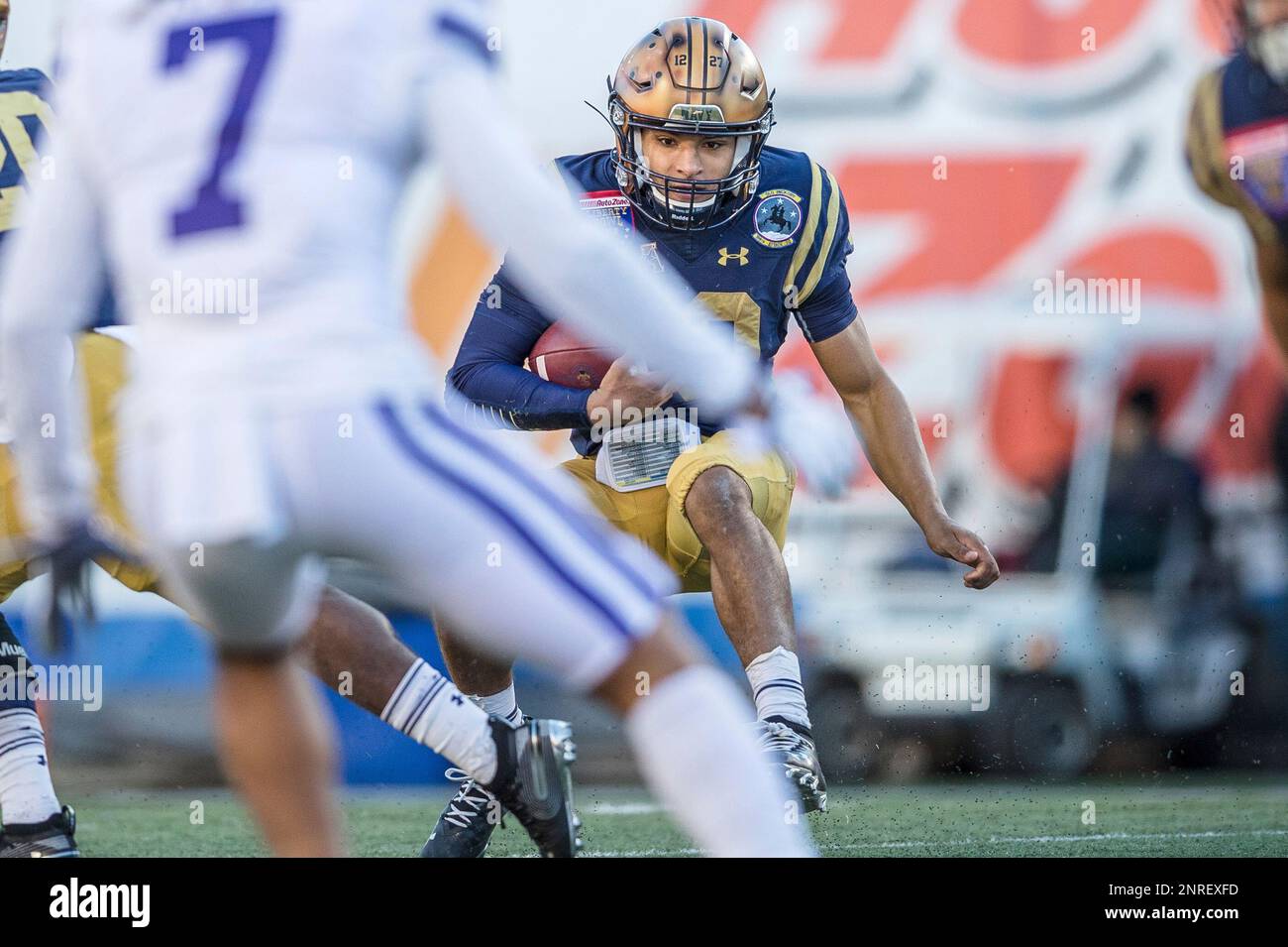 December 31, 2019: Navy Midshipmen quarterback Malcolm Perry (10) runs ...
