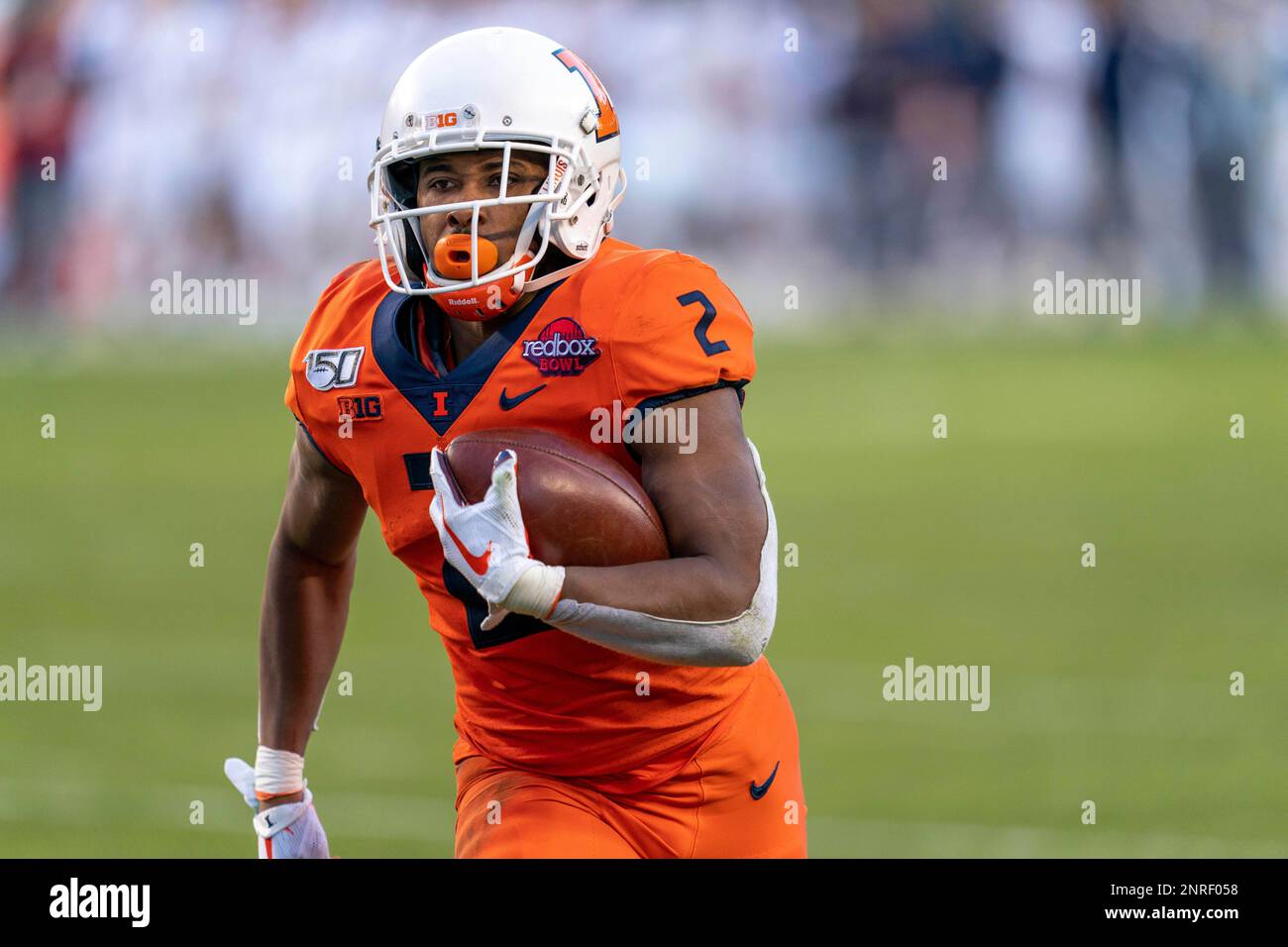 Illinois Fighting Illini running back Reggie Corbin (2) runs in for the ...