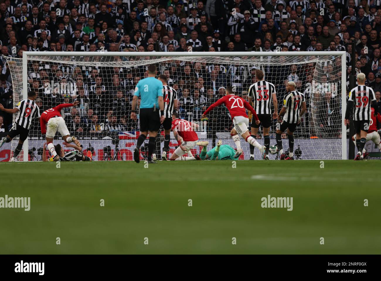 Wembley, UK. 26th Feb, 2023. Casemiro (MU), left, scores the first Man Utd goal (1-0) at the ...