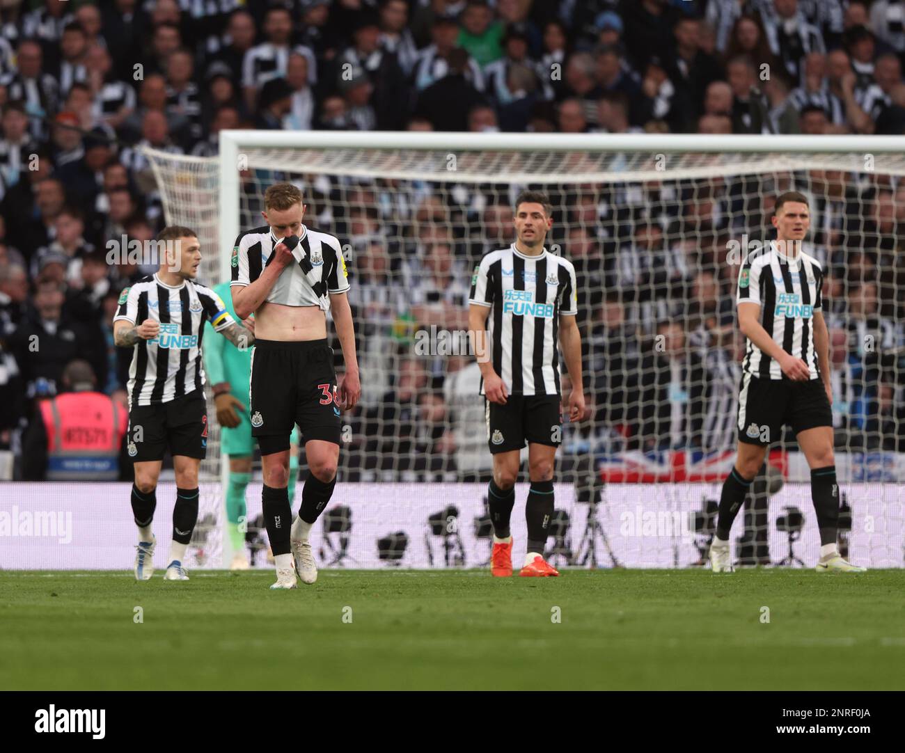Wembley, UK. 26th Feb, 2023. Sean Longstaff (NU) dejection after the second Man Utd goal (2-0 ...