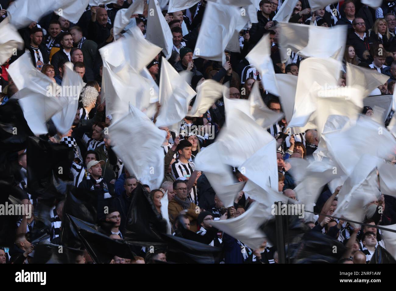 Wembley, UK. 26th Feb, 2023. Newcastle fans waving their flags at the ...