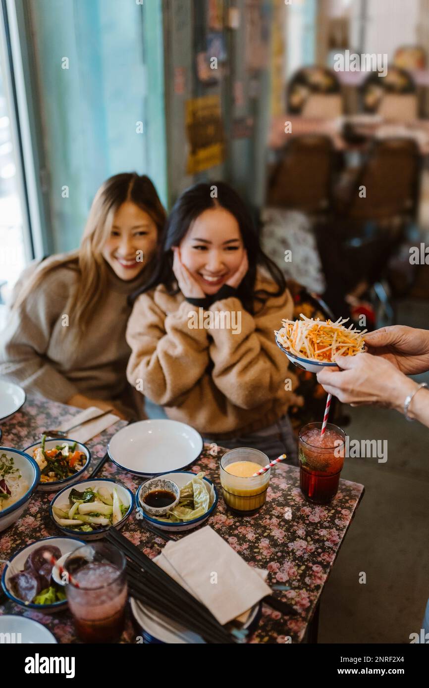 Food being served hi-res stock photography and images - Alamy