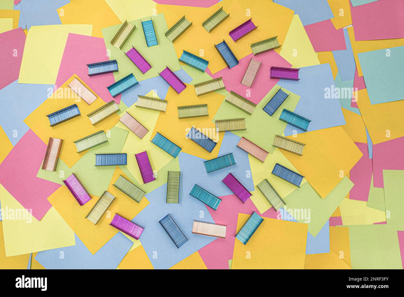 Multicolored office metal staples for stapler on multicolored paper ...