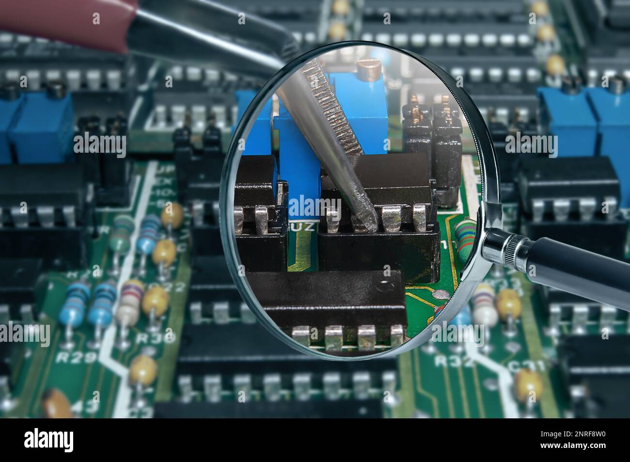 view of printed circuit board with active and passive surface mounted ...