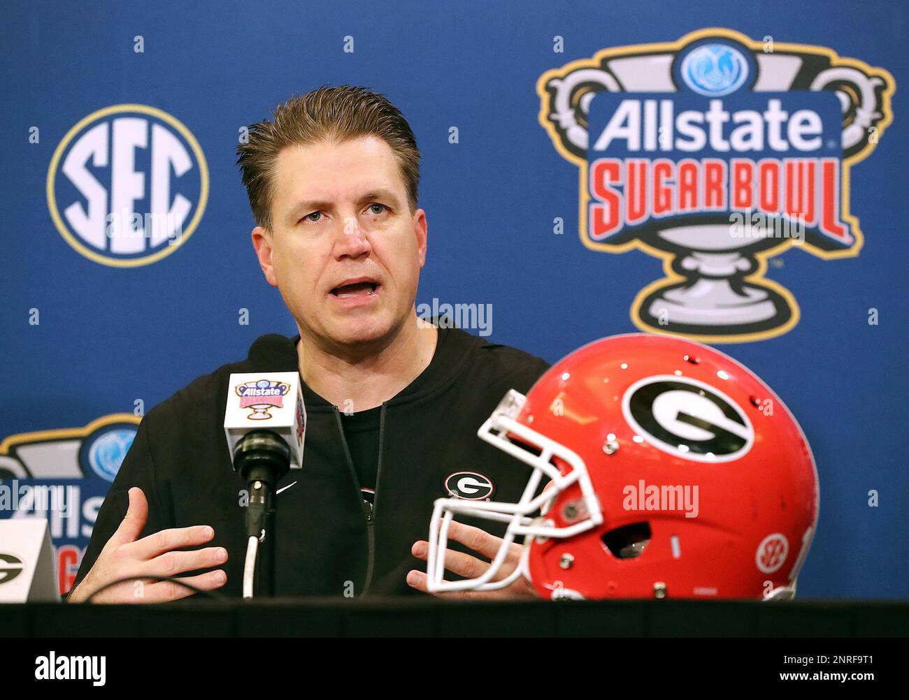 Georgia offensive coordinator James Coley takes questions from the ...