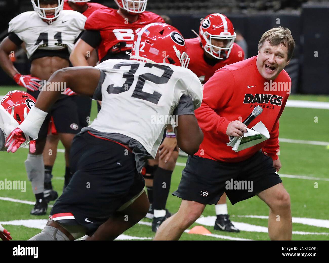 Georgia head coach Kirby Smart encourages linebacker Monty Rice during ...