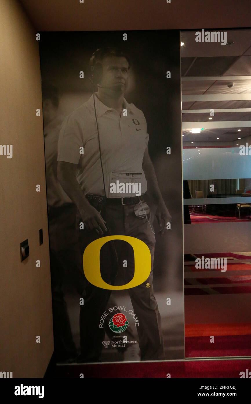 Detailed view of signage featuring Oregon Ducks coach Mario Cristobal ...