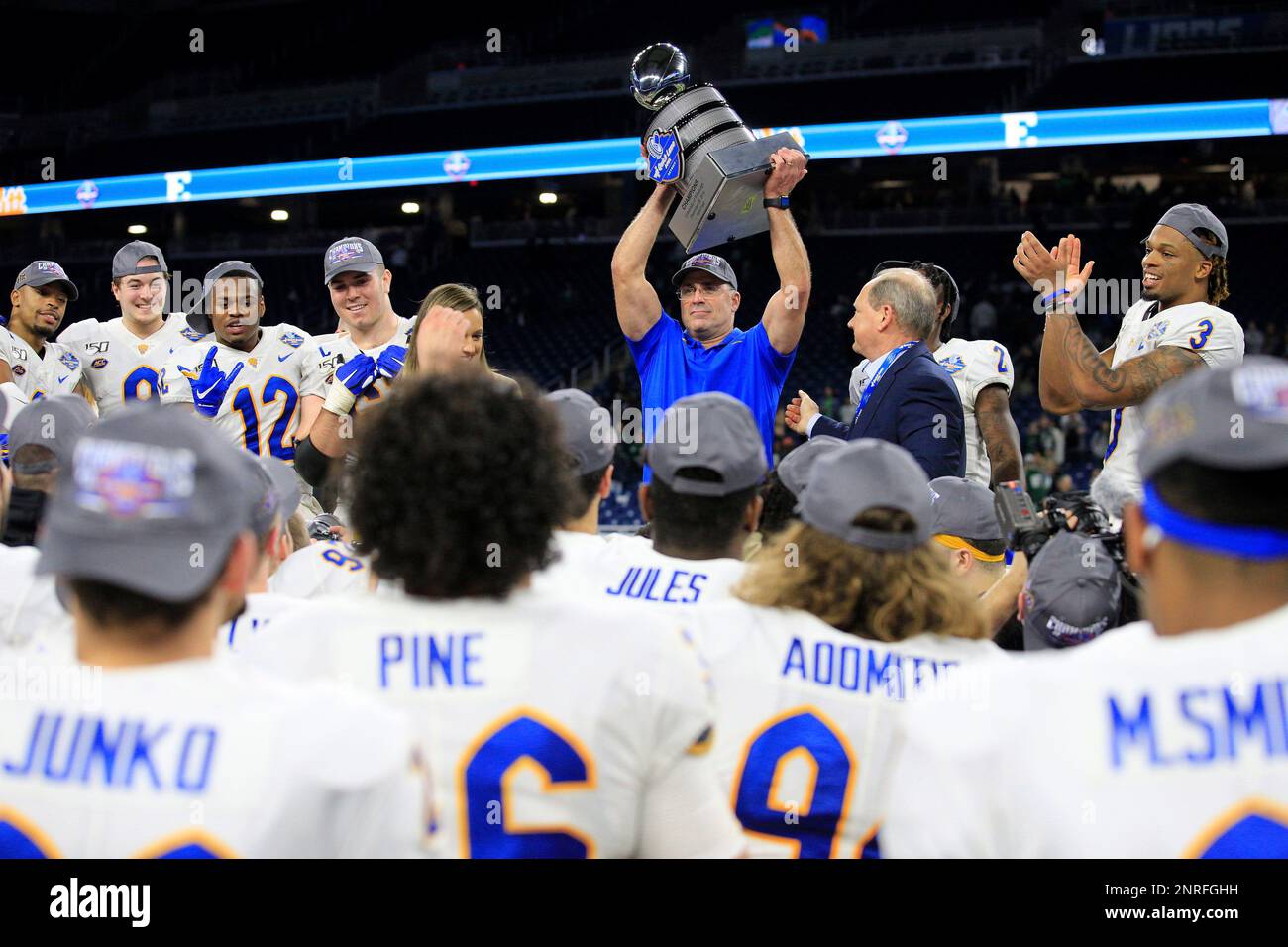 December 26, 2019: Pittsburgh Panthers head coach Pat Narduzzi raises trophy at the NCAA Quick ...