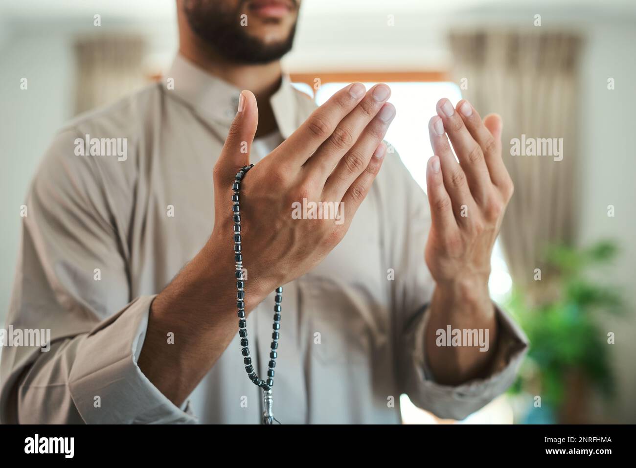 We pray to be united into love. a unrecognizable muslim man praying in ...
