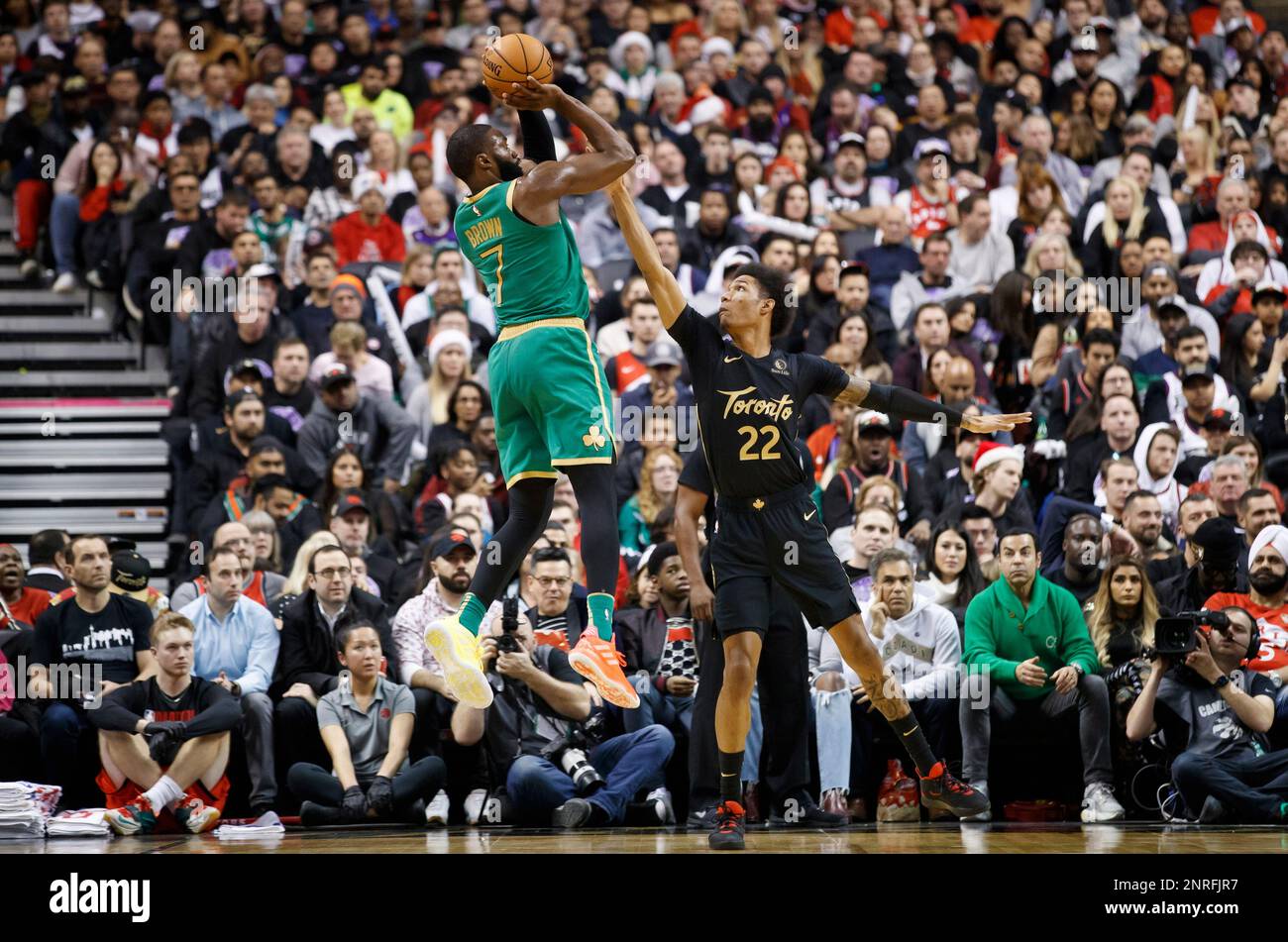 Boston Celtics guard Jaylen Brown (7) puts up a jumps hot over Toronto ...
