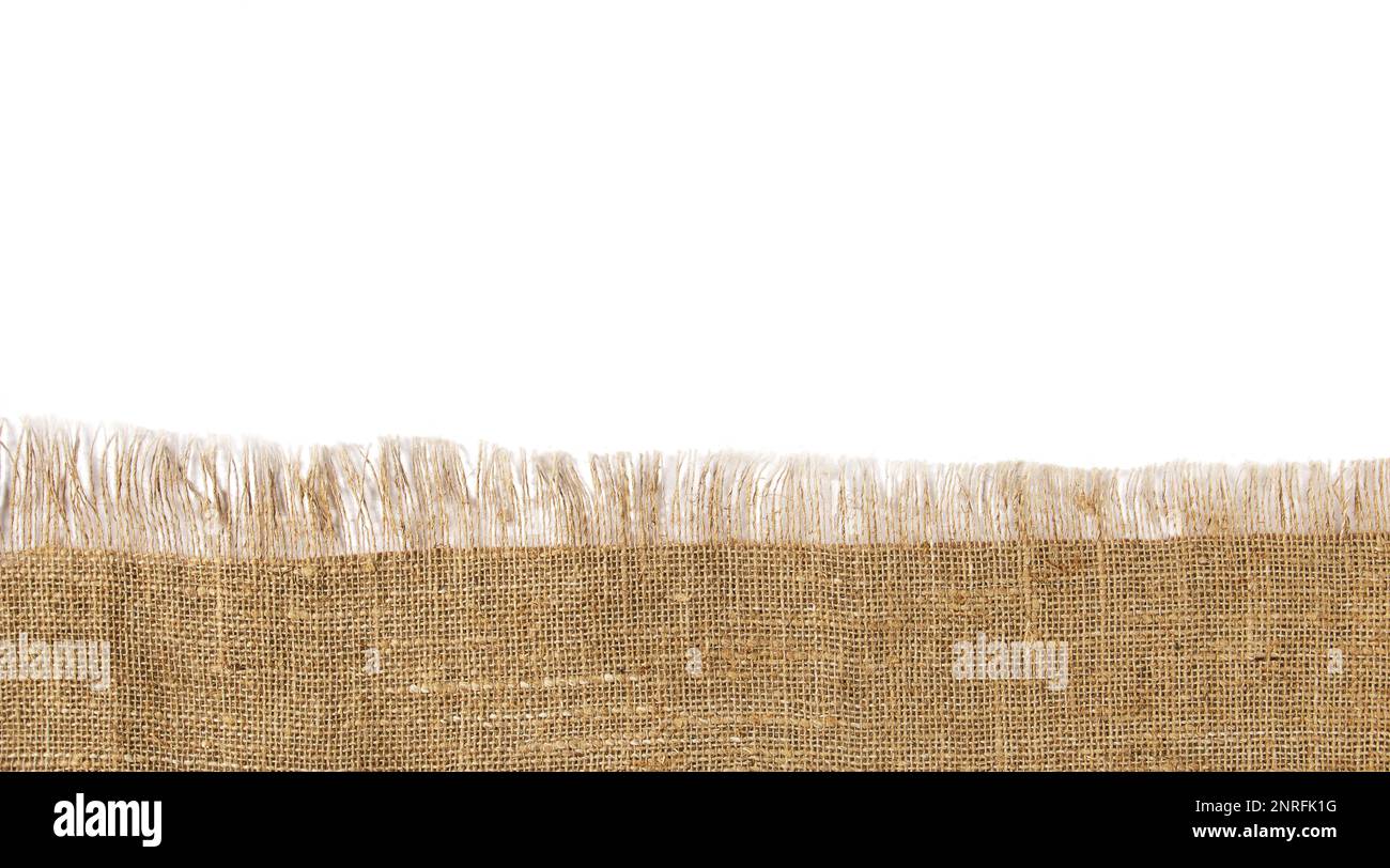 A piece of burlap with fringe on white background for text or banner ...