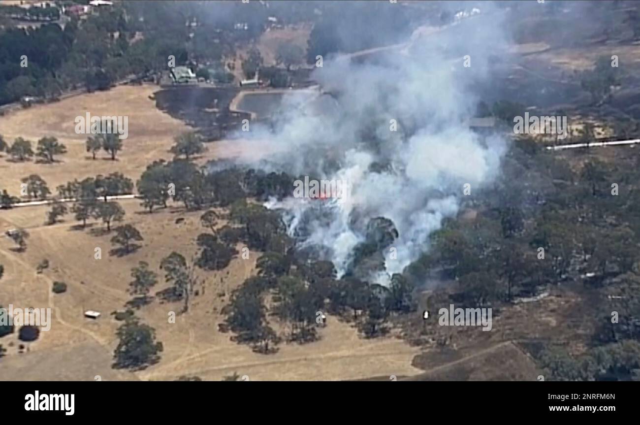 In this image made from video, an aerial scene shows wildfires burning ...