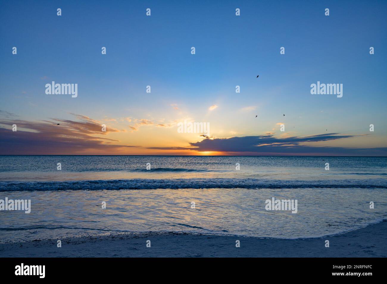 Sunset over warm waters hi-res stock photography and images - Alamy