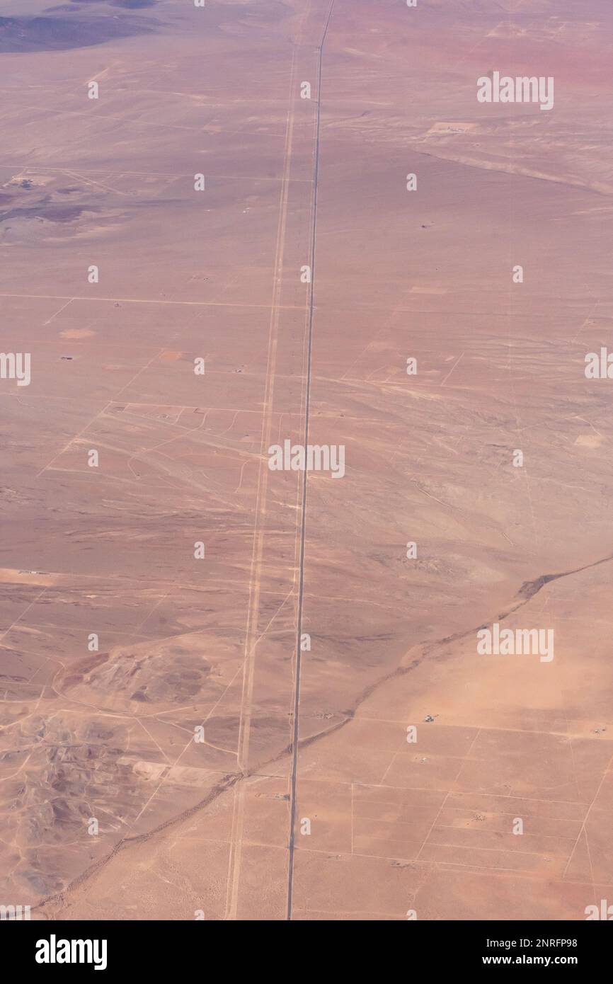 Aerial view of a desert road and land parcels Stock Photo - Alamy