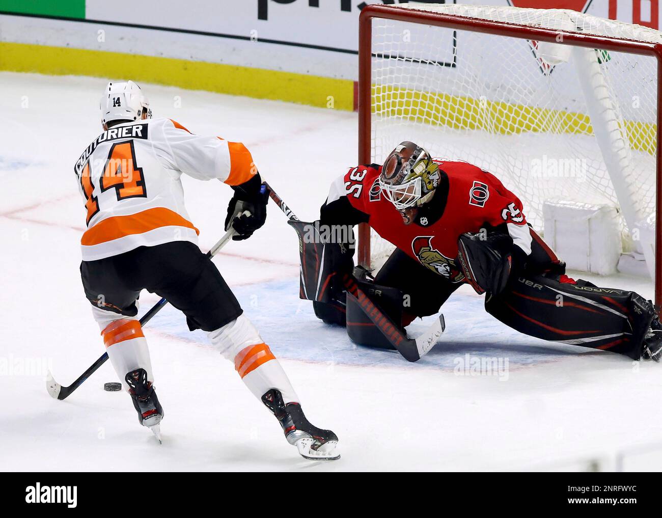 Philadelphia Flyers center Sean Couturier (14) scores on Ottawa ...