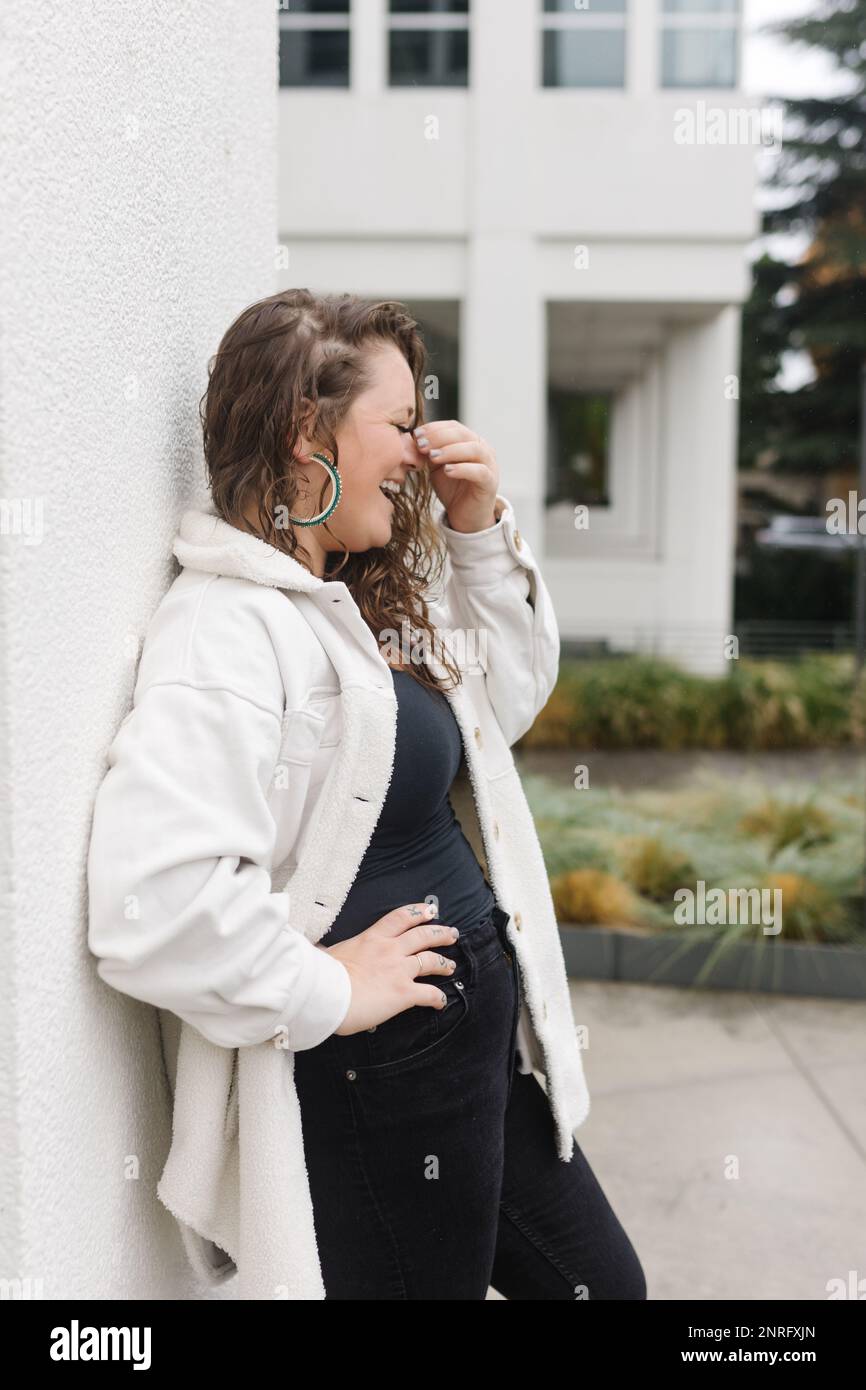 Woman dressed in white jacket hi-res stock photography and images - Alamy