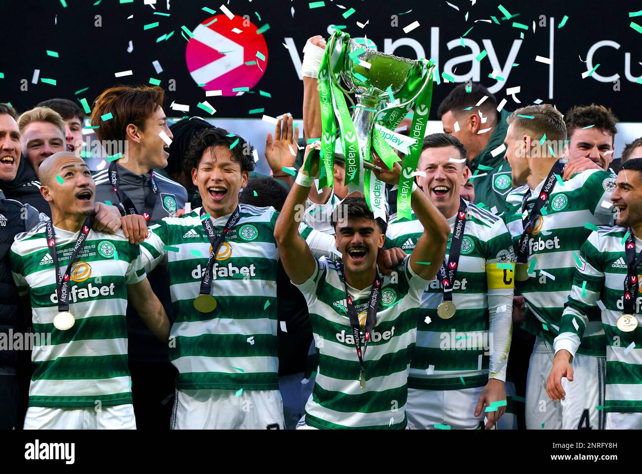 Celtic's Jota celebrates with the Viaplay Sports Cup trophy after ...