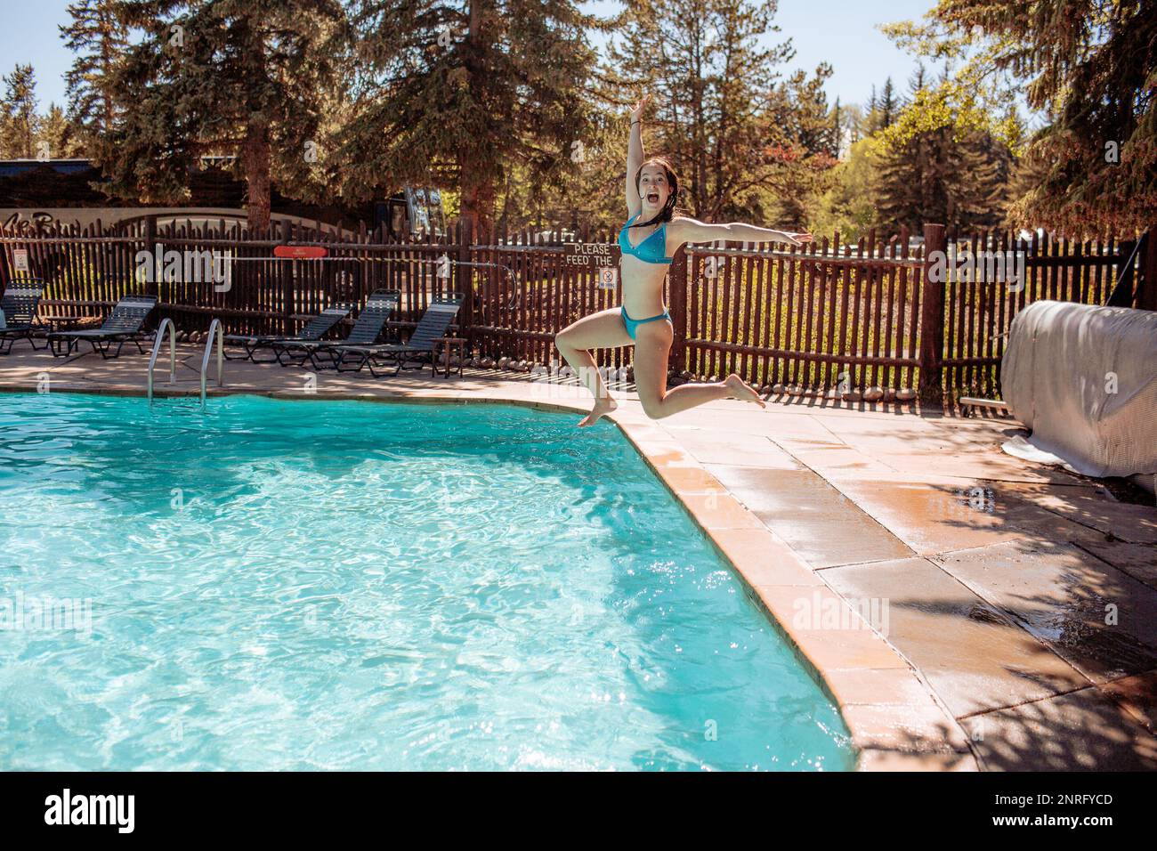 goofy girl jumping into pool Stock Photo - Alamy goofy girl jumping into pool Stock Photo - Alamy
