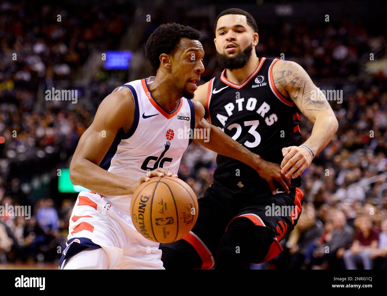 Washington Wizards guard Ish Smith (14) moves past Toronto Raptors ...
