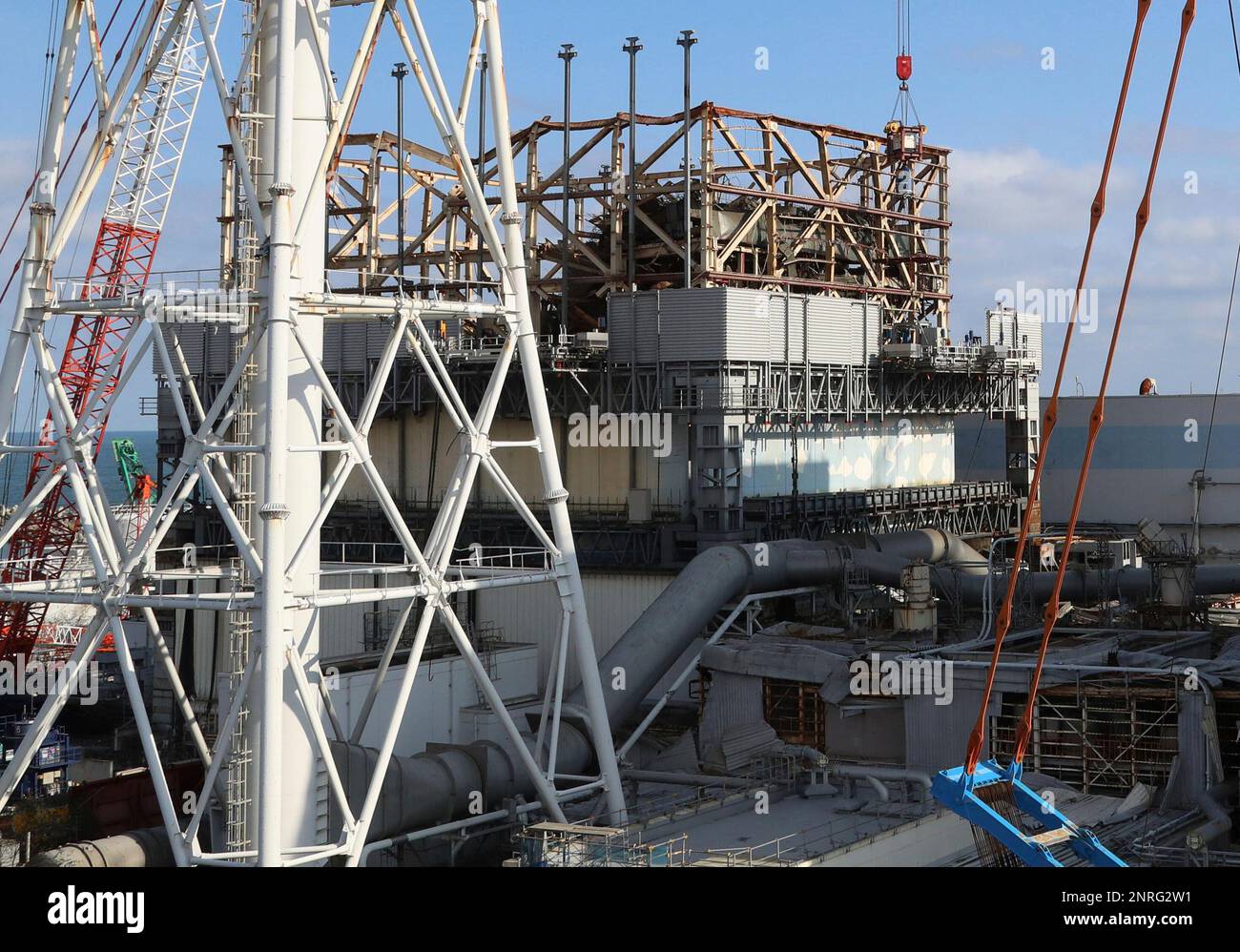 The Unit 1 (C) and a radioactive waste treatment building (right bottom ...