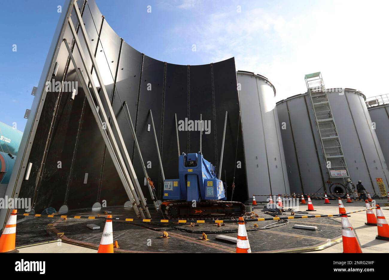 The extension work of storage tanks for treated water is operated in ...