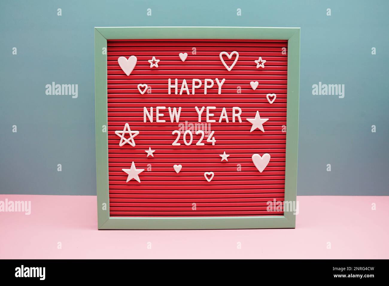 Happy New Year 2024 alphabet letters on pink and blue background Stock ...