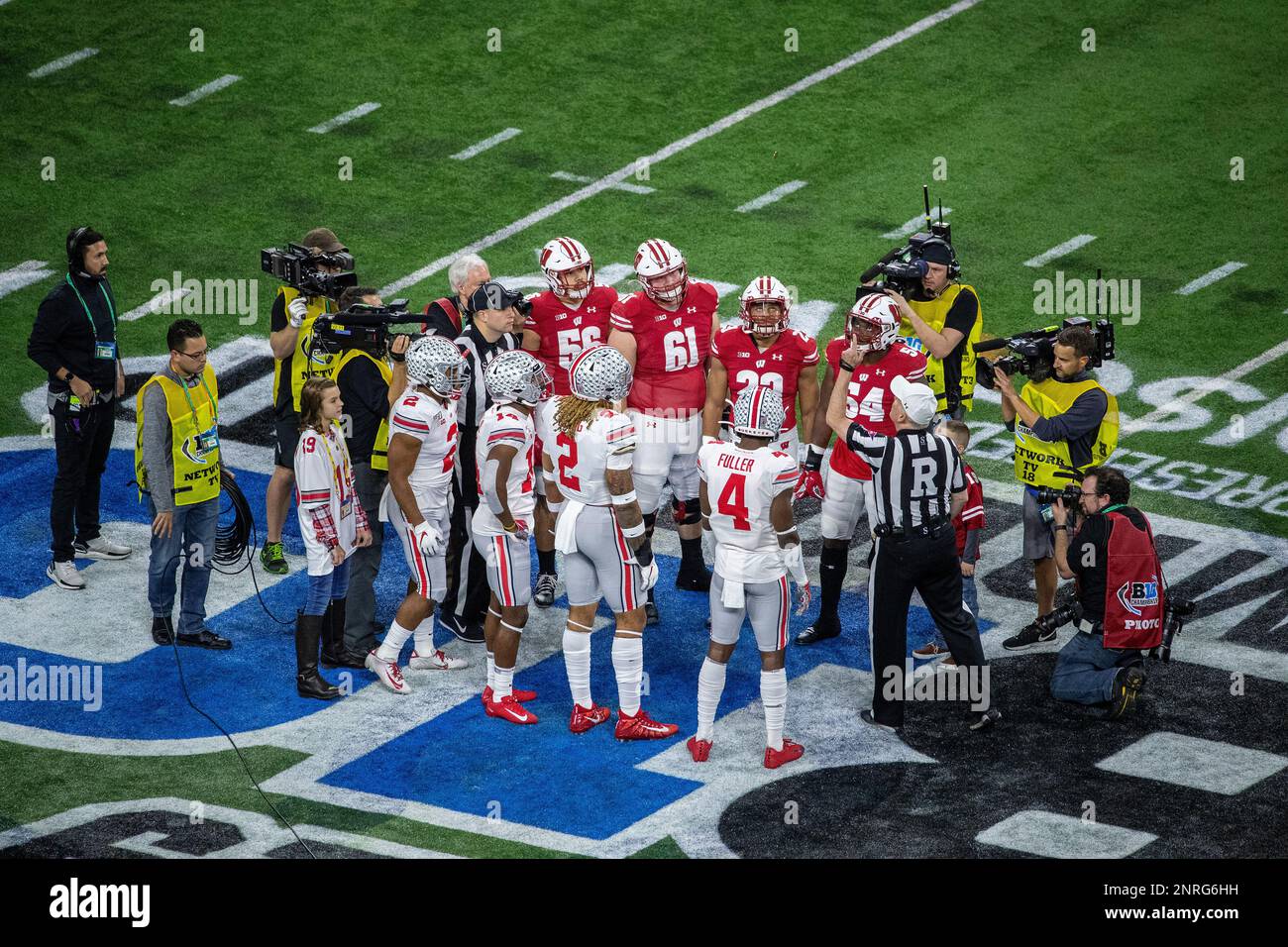 An overhead view of the coin toss before the Wisconsin Badgers NCAA Big ...