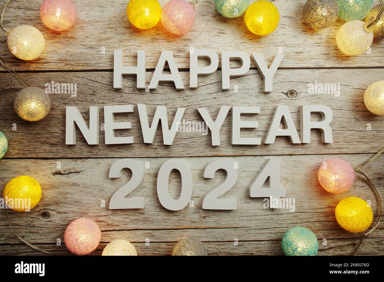 Happy New Year 2024 alphabet letters on wooden background Stock Photo ...