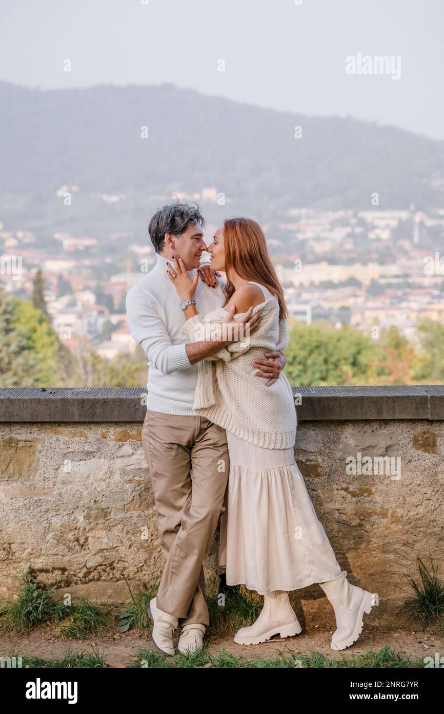 Loving couple are smiling, hugging and look at each other Stock Photo ...